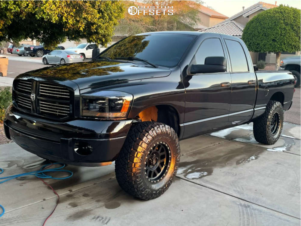 2007 Dodge Ram 1500 with 17x8.5 0 Method Grid and 35/12.5R17 Nitto ...