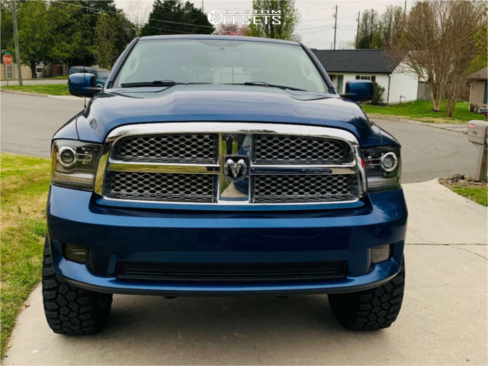 2009 Dodge Ram 1500 with 20x10 -24 Method Mr605 and 35/12.5R20 Cooper ...