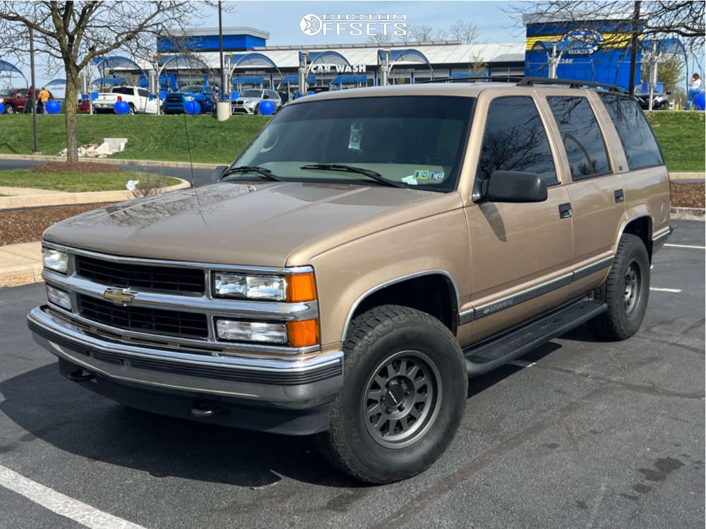1999 Chevrolet Tahoe with 16x8 0 Method Mr704 and 285/75R16 Cooper ...