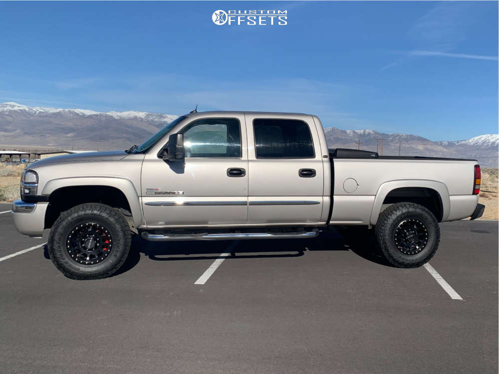 2005 GMC Sierra 2500 HD with 17x8.5 0 Method 305 Nv and 285/75R17 Toyo ...