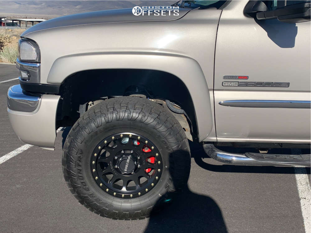 2005 GMC Sierra 2500 HD with 17x8.5 0 Method 305 Nv and 285/75R17 Toyo ...