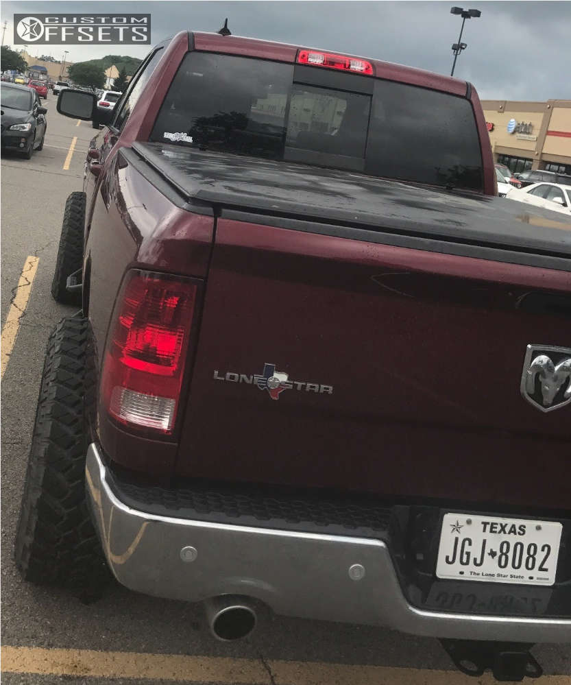 2016 Ram 1500 with 20x12 -44 Moto Metal Mo970 and 35/12.5R20 Nitto ...