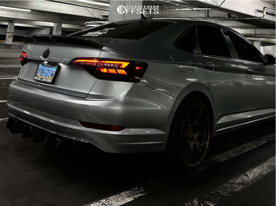 2021 Volkswagen Jetta with 18x9.5 35 Aodhan Ah-x and 225/40R18 Vercelli ...