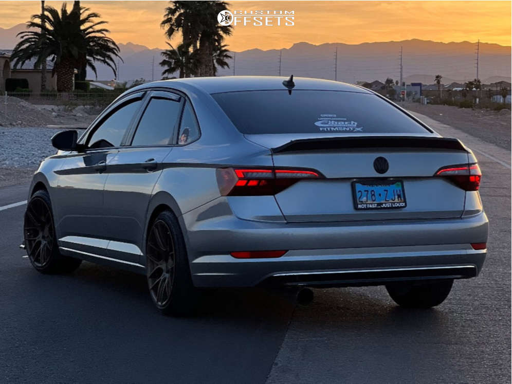 2021 Volkswagen Jetta with 18x9.5 35 Aodhan Ah-x and 225/40R18 Vercelli ...