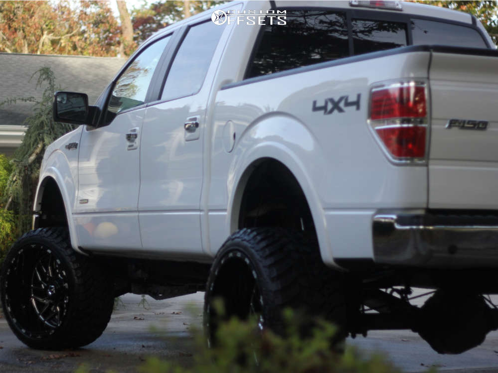 2014 Ford F-150 with 24x14 -76 TIS 544bm and 35/13.5R24 AMP Mud Terrain ...