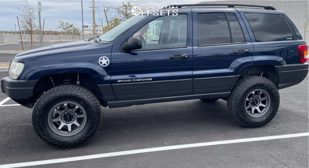 2004 Jeep Grand Cherokee with 16x8 Vision Flow and 265/75R16 Falken ...