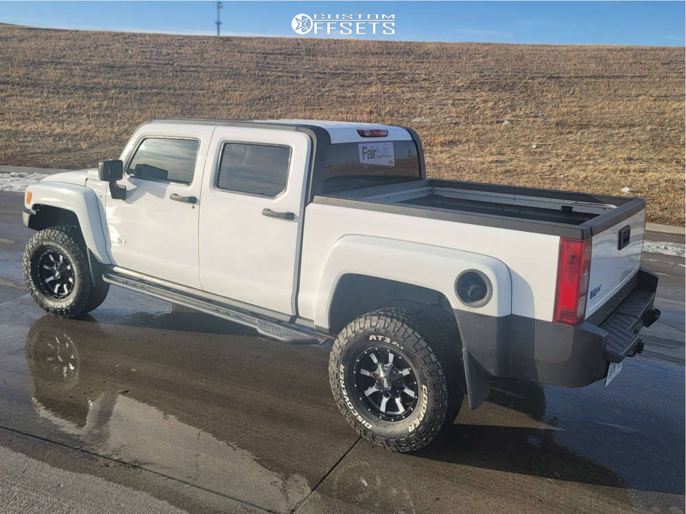 2009 Hummer H3T with 16x9 0 Moto Metal MO970 and 285/75R16 Cooper ...