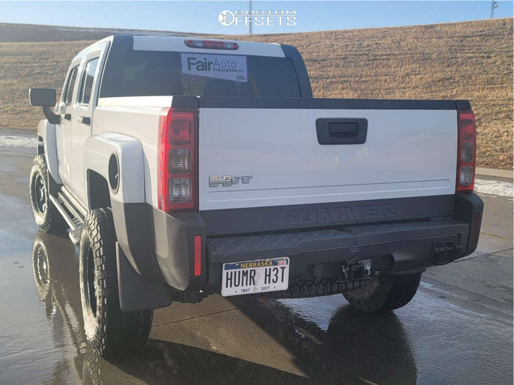 2009 Hummer H3T with 16x9 0 Moto Metal MO970 and 285/75R16 Cooper ...