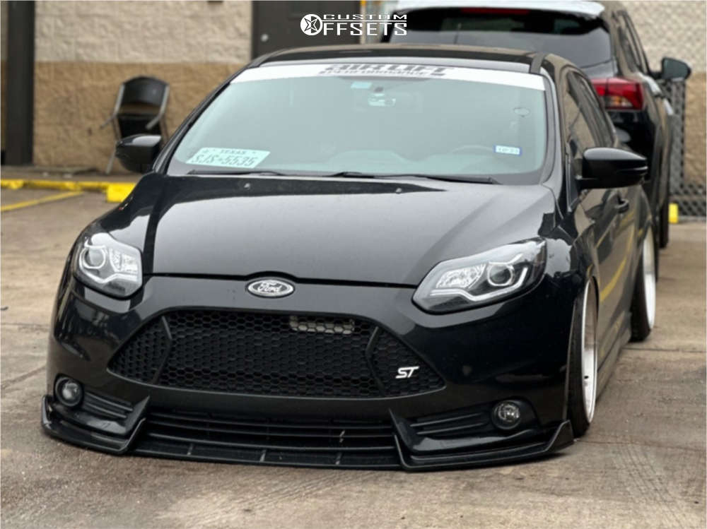 2014 Ford Focus with 18x9.5 35 ESR Cs15 and 215/35R18 Crosswind HP010 ...