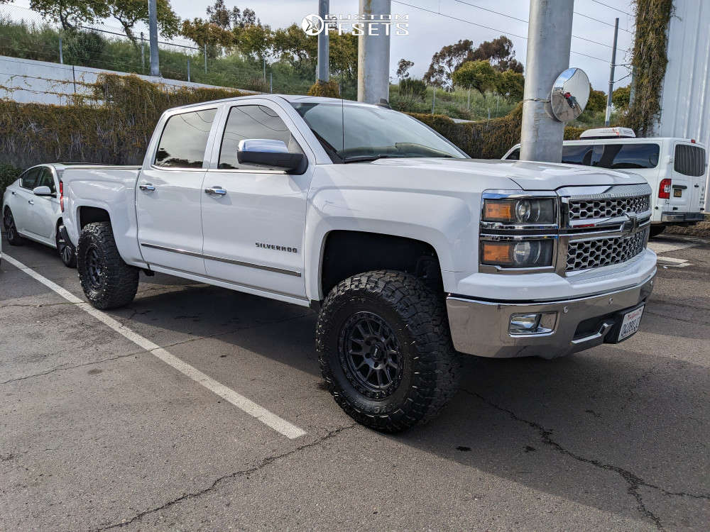 2015 Chevrolet Silverado 1500 with 17x9 -12 MVX Offroad Vx12 and 35/12.5R17 Toyo Tires Open ...