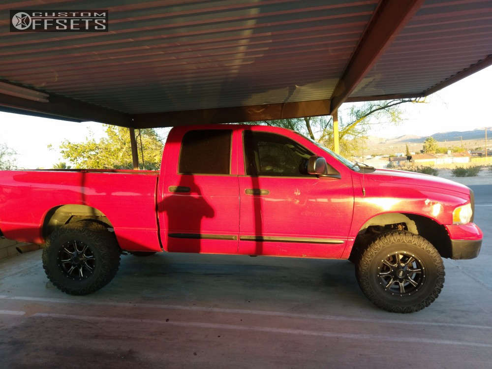 2005 Dodge Ram 1500 with 17x8 0 Moto Metal Mo970 and 35/12.5R17 Cooper ...