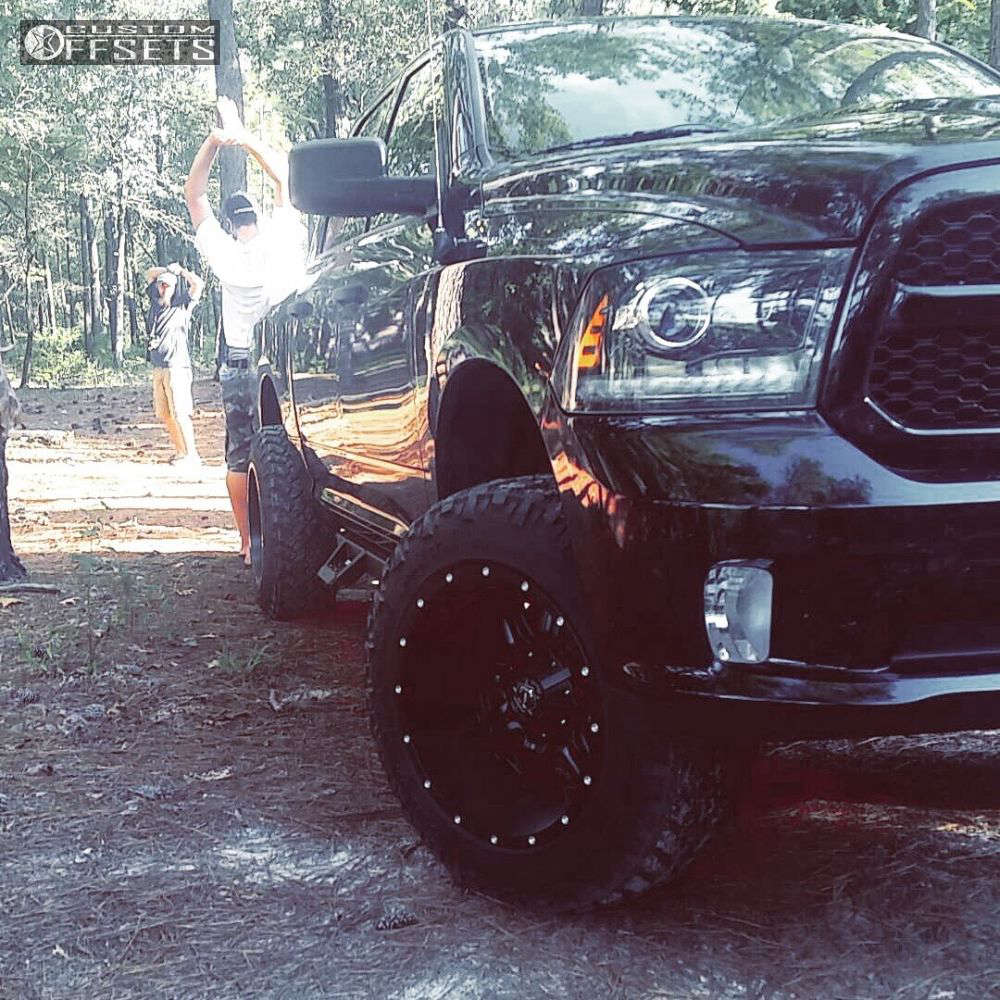 2014 Ram 1500 with 20x12 -44 TIS 535B and 35/12.5R20 Nitto Trail ...