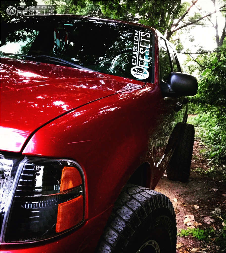 2004 Ford Explorer with 15x10 -46 Eagle Alloy Series 185 and 33/12.5R15 ...