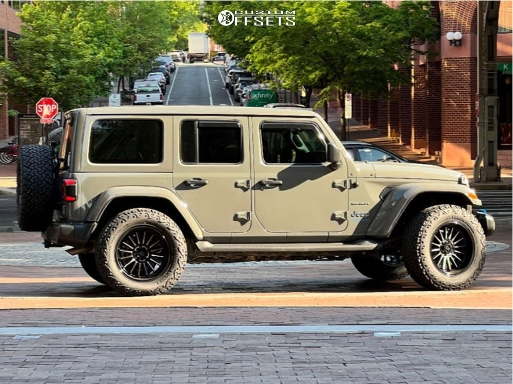 2023 Jeep Wrangler with 20x10 -18 XD Xd857 and 35/12.5R20 Venom Power ...