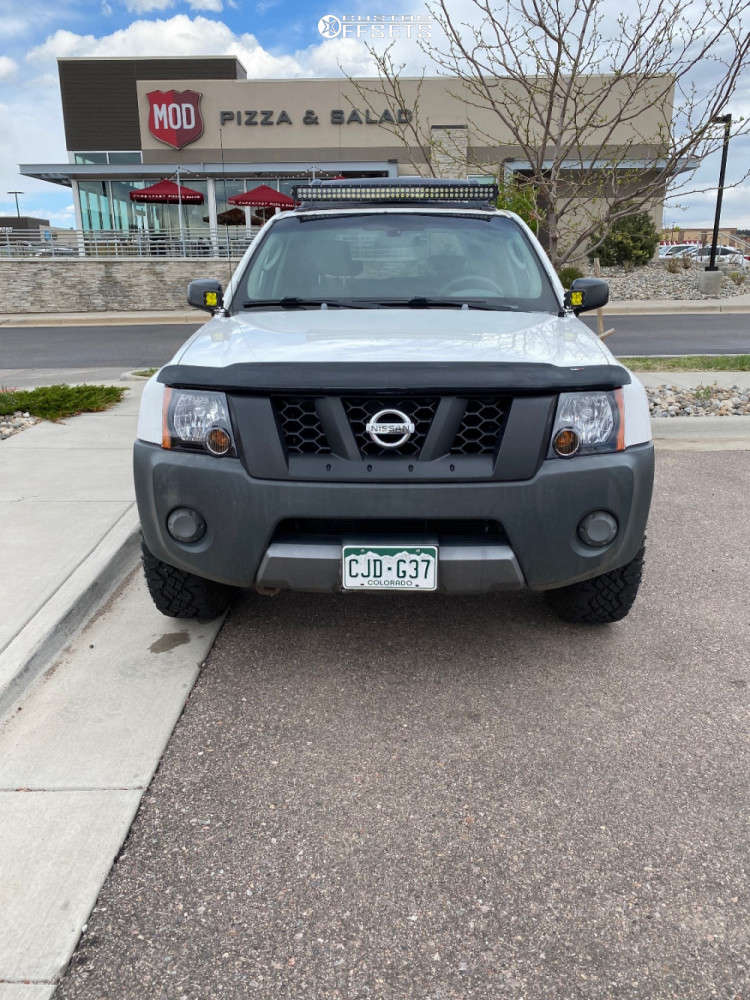 2006 Nissan Xterra with 16x8 0 Black Rhino Chamber and 265/75R16 ...