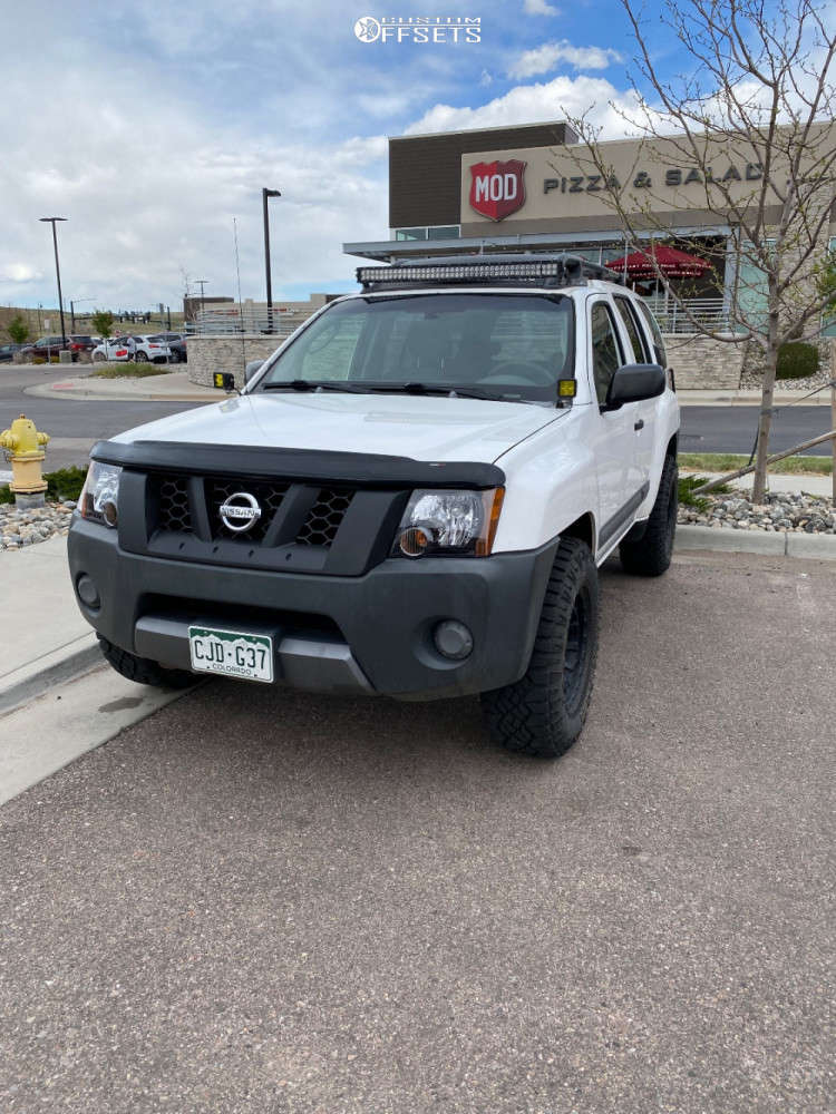 2006 Nissan Xterra with 16x8 0 Black Rhino Chamber and 265/75R16 ...