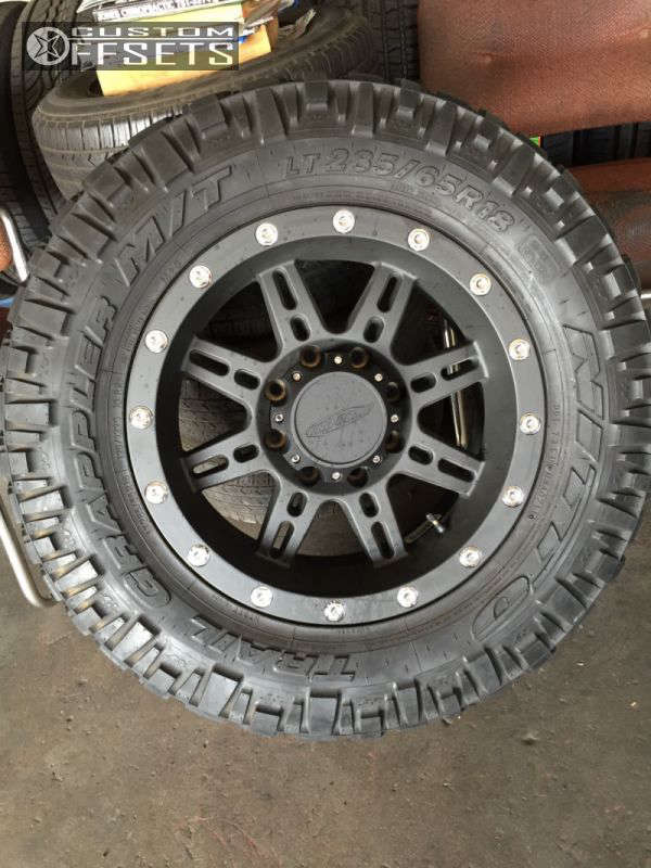 2011 Ram 2500 with 18x9 0 Pro Comp Series 31 and 285/65R18 Nitto Trail ...