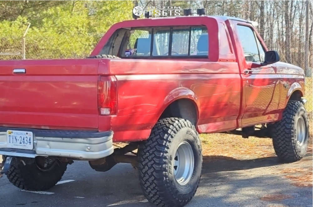 1995 Ford F-150 with 15x10 -45 Pacer Chrome Spoke and 35/12.5R15 Falken ...