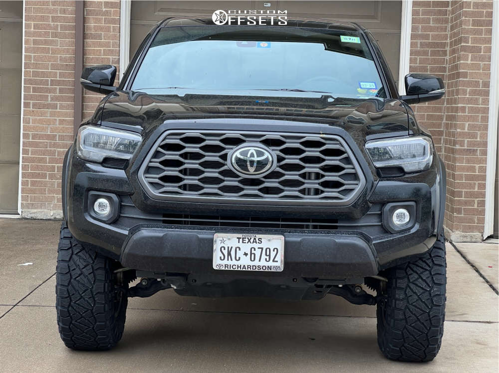 2023 Toyota Tacoma with 17x8.5 Method Mr703 and 285/70R17 Nitto Ridge ...