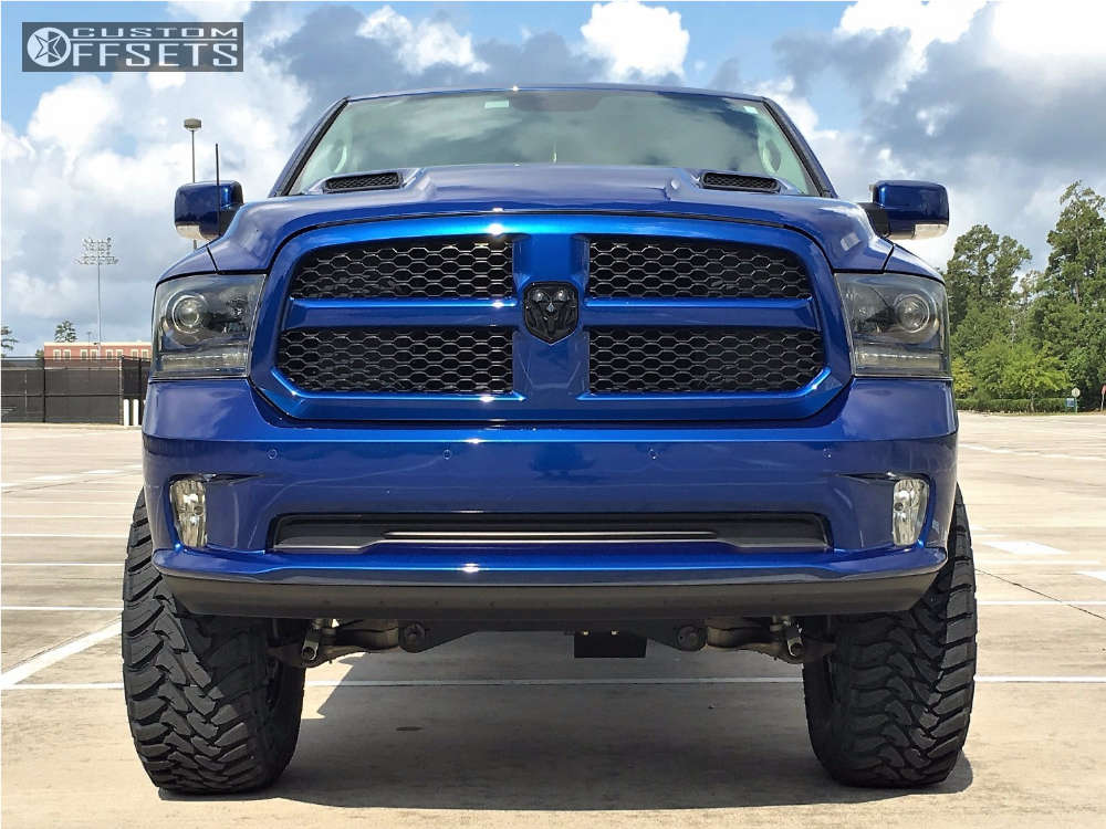 2015 Ram 1500 with 18x9 1 Fuel Anza and 37/13.5R18 Toyo Tires Open ...