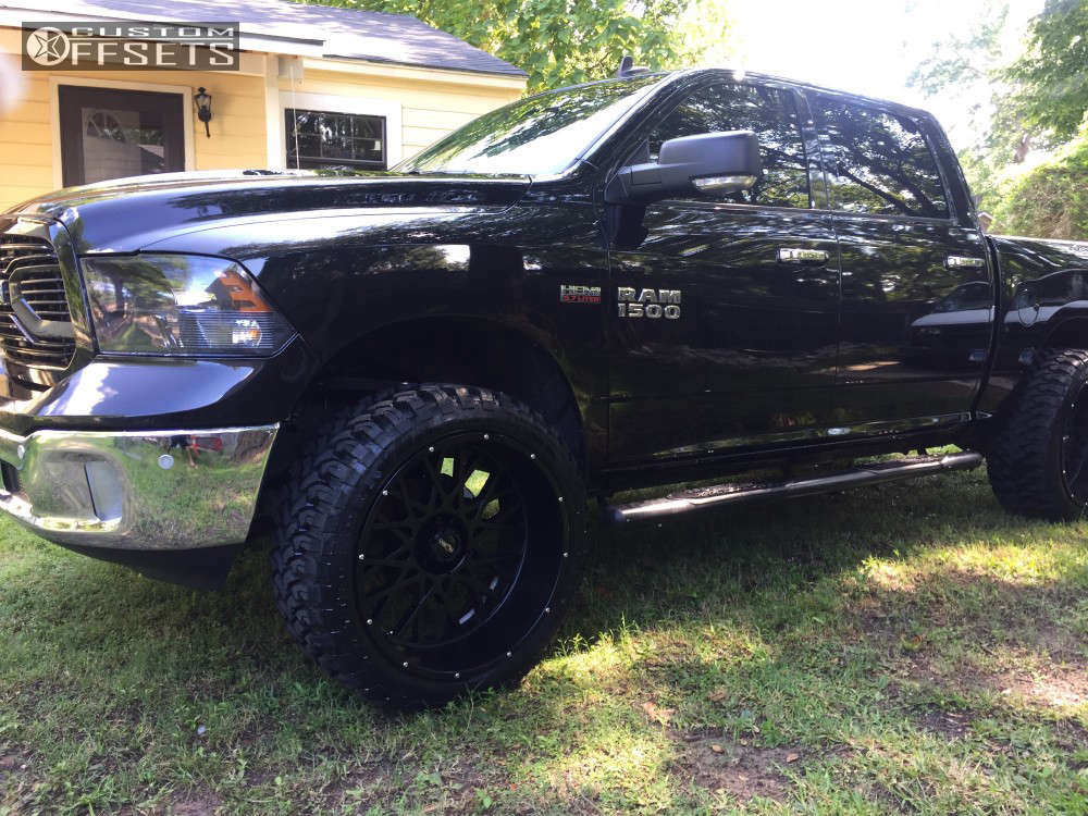 2016 Ram 1500 with 24x12 -51 Vision Rocker and 35/12.5R24 Comforser ...