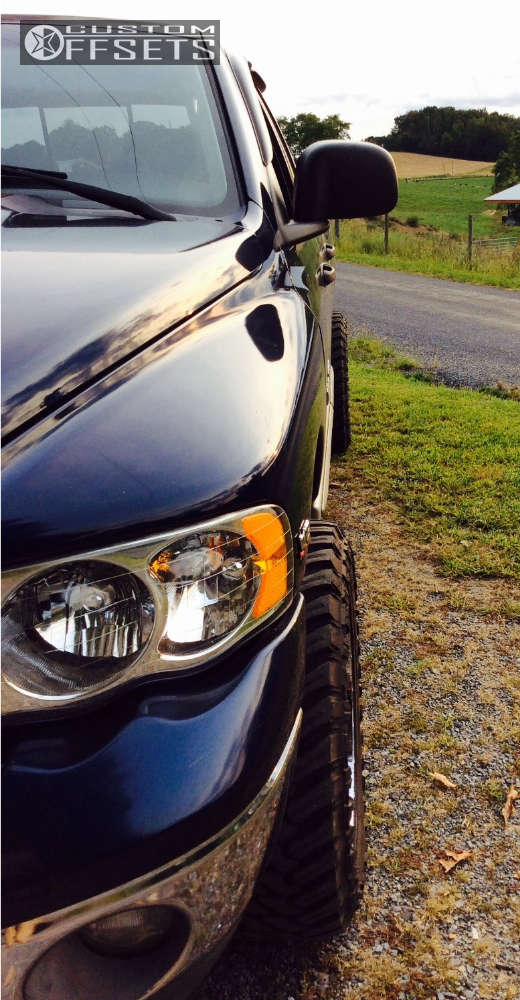 2002 Dodge Ram 1500 with 20x10 -24 American Truxx Vortex and 33/12.5R20 ...