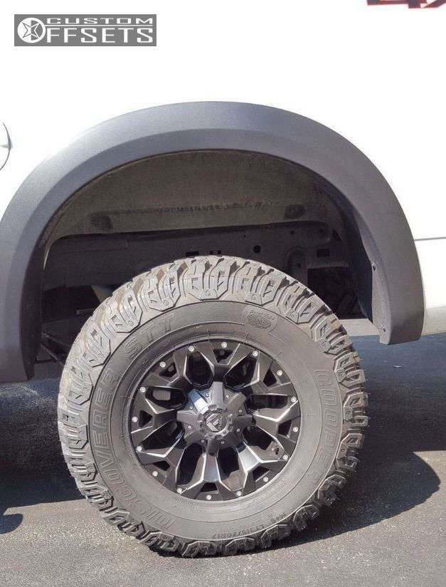 2015 Ram 2500 with 17x9 -12 Fuel Assault and 315/70R17 Cooper ...