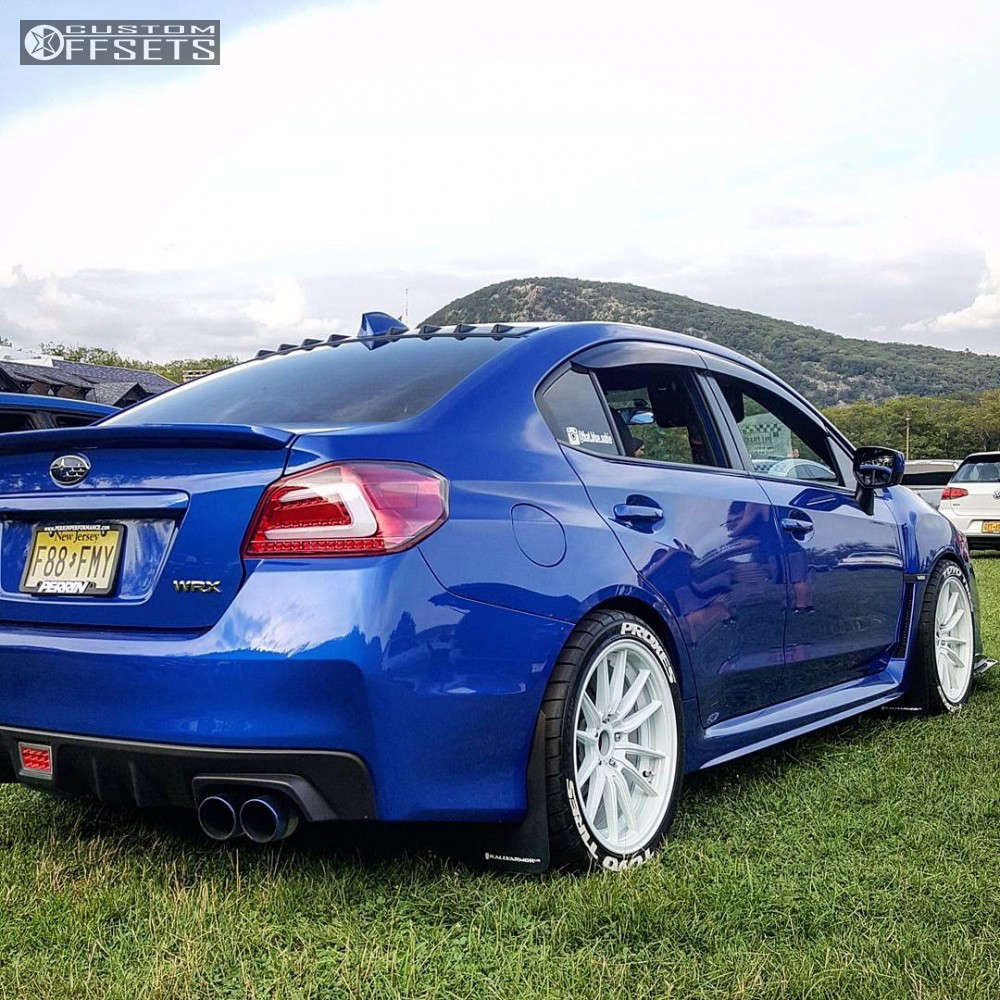2015 Subaru WRX with 18x9.5 35 Cosmis Racing R1 and 265/35R18 Toyo ...