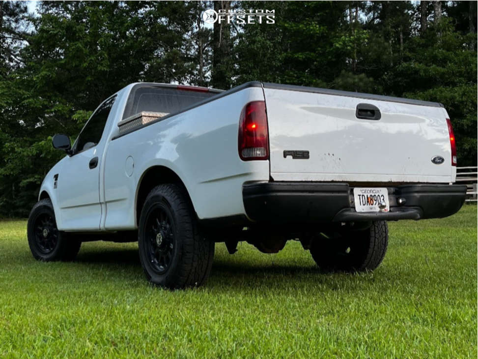 1999 Ford F-150 with 18x9 -12 Anthem Off-Road Intimidator and 265/65R18 ...