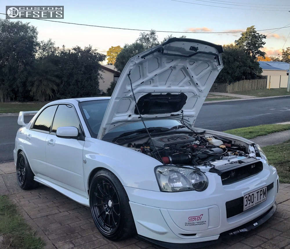 2005 Subaru WRX STI with 18x9.5 18 Enkei Nt03 and 235/45R18 Bridgestone ...