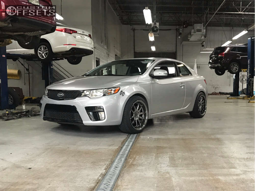2013 Kia Forte Koup with 18x9.5 15 Aodhan DS02 and 235/40R18 Nankang NS ...