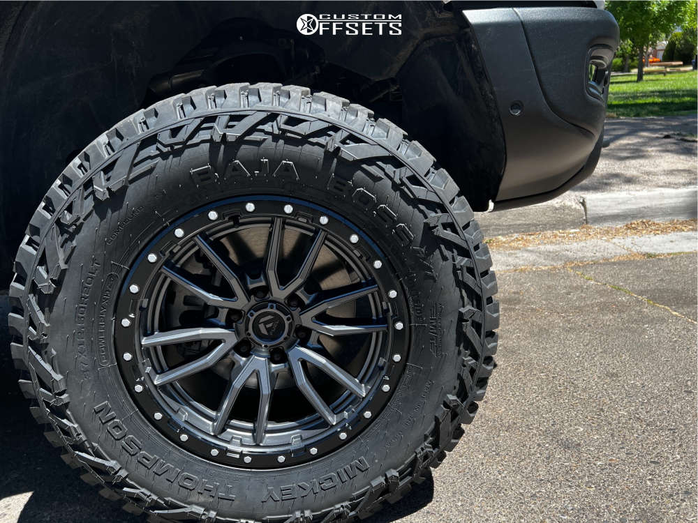 2023 Ram 1500 with 20x9 1 Fuel Rebel 6 and 37/12.5R20 Mickey Thompson ...