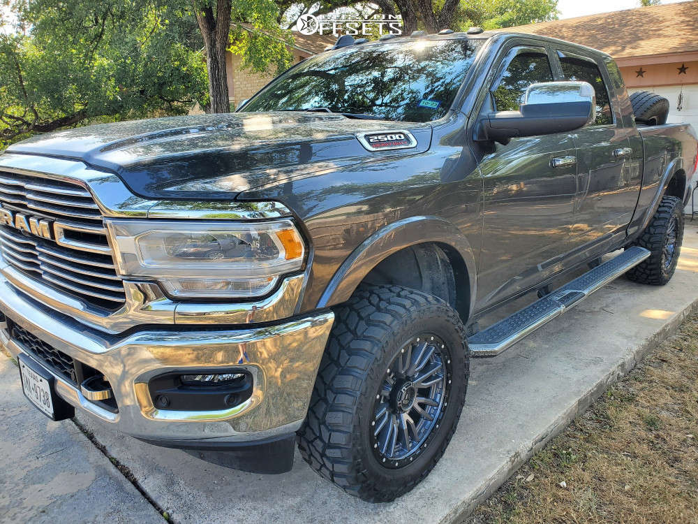 2022 Ram 2500 with 20x9 1 Fuel Rebel 8 and 305/55R20 Cooper Discoverer ...