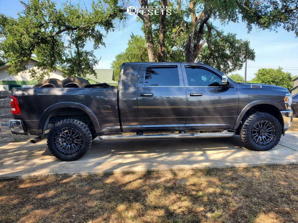 2022 Ram 2500 with 20x9 1 Fuel Rebel 8 and 305/55R20 Cooper Discoverer ...