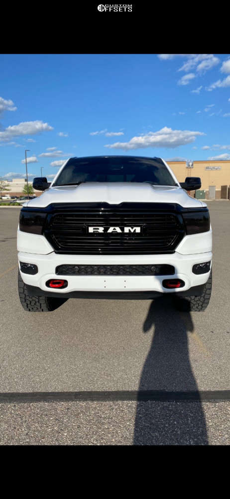 2021 Ram 1500 with 22x10 -19 TIS 554BM and 35/12.5R22 Toyo Tires Open ...