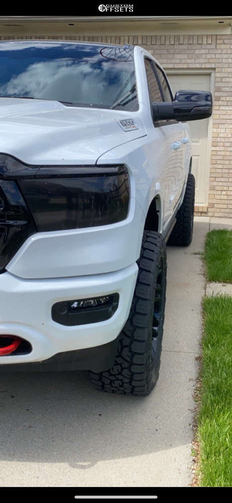 2021 Ram 1500 with 22x10 -19 TIS 554BM and 35/12.5R22 Toyo Tires Open ...