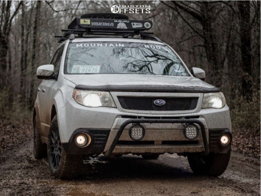 2010 Subaru Forester with 16x7 40 Voxx Orso and 215/65R16 General ...