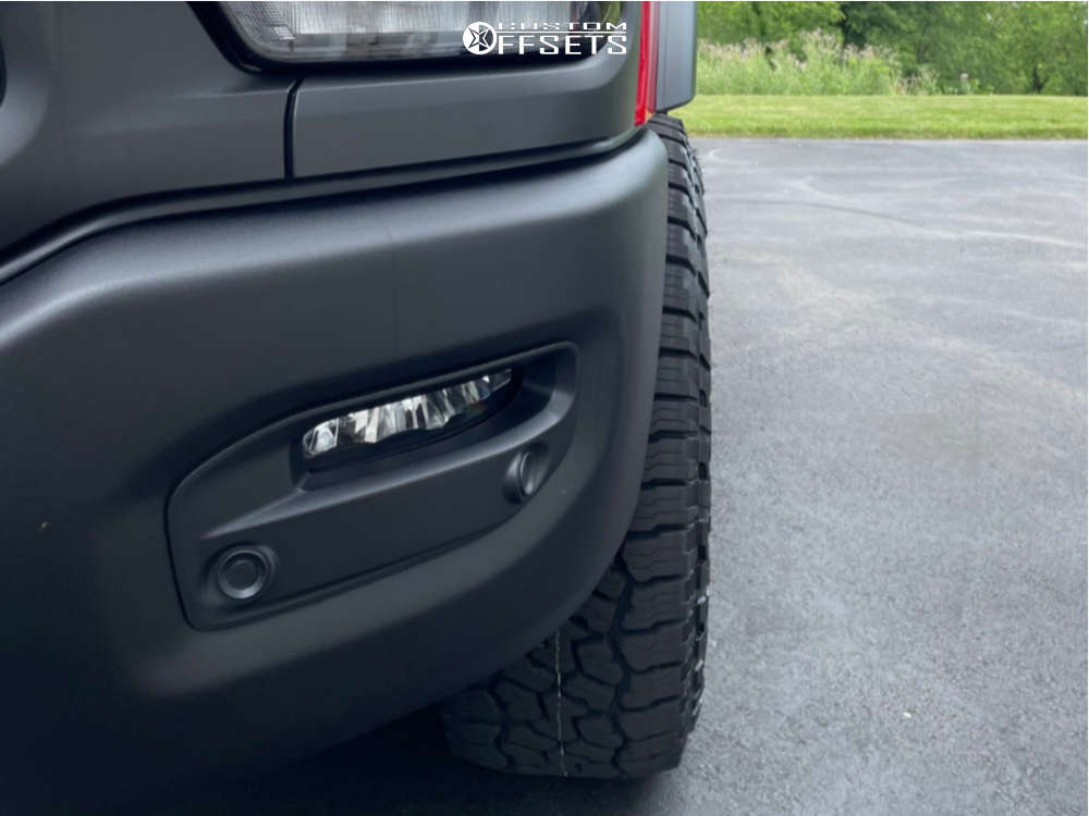 2023 Ram 2500 with 18x9 18 Method Mr317 and 35/12.5R18 Falken WildPeak ...