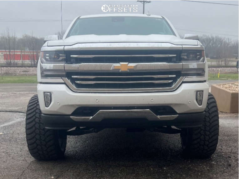 2017 Chevrolet Silverado 1500 with 22x14 -76 Hostile Forged Sprocket and 35/13.5R22 AMP Mud ...