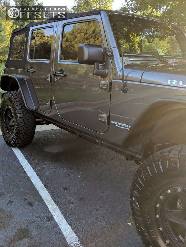 2014 Jeep Wrangler with 17x9 -12 American Racing ATX Ax194 and 37/12 ...