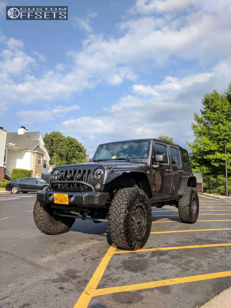 2014 Jeep Wrangler with 17x9 -12 American Racing ATX Ax194 and 37/12 ...