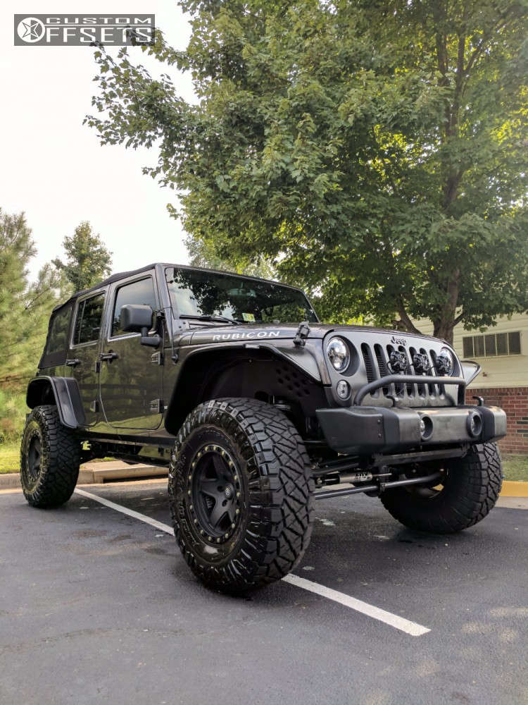2014 Jeep Wrangler with 17x9 -12 American Racing ATX Ax194 and 37/12 ...