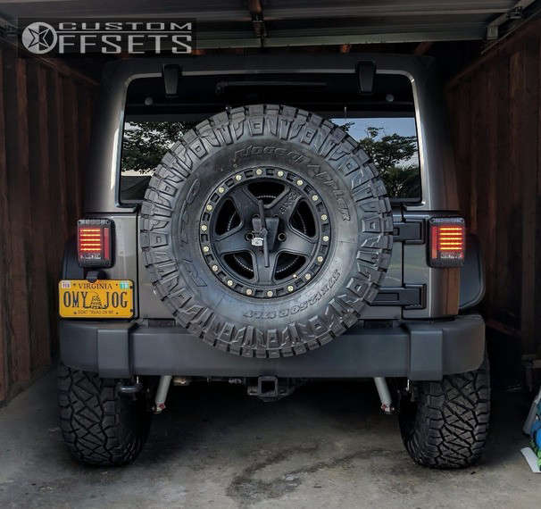 2014 Jeep Wrangler with 17x9 -12 American Racing ATX Ax194 and 37/12 ...