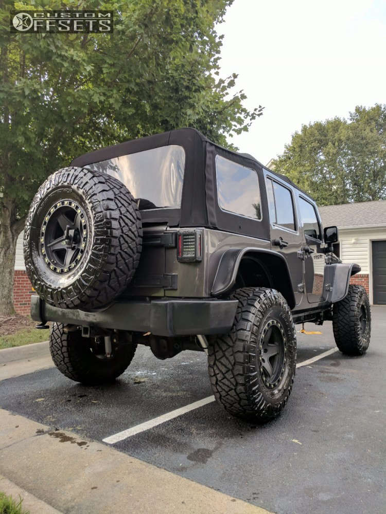 2014 Jeep Wrangler with 17x9 -12 American Racing ATX Ax194 and 37/12 ...
