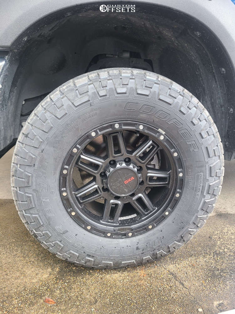 2021 Ram 2500 with 18x9 DX4 Rebel and 295/70R18 Cooper Discoverer At3 ...