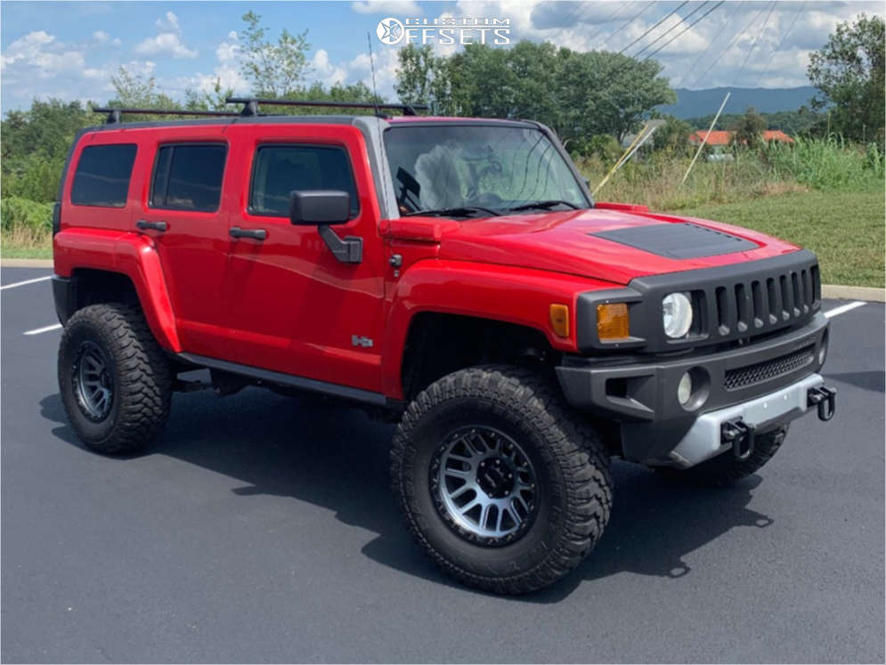 2009 Hummer H3 with 17x9 -12 Vision Nemesis and 35/12.5R17 Radar Renegade R7 Mt and Leveling Kit ...