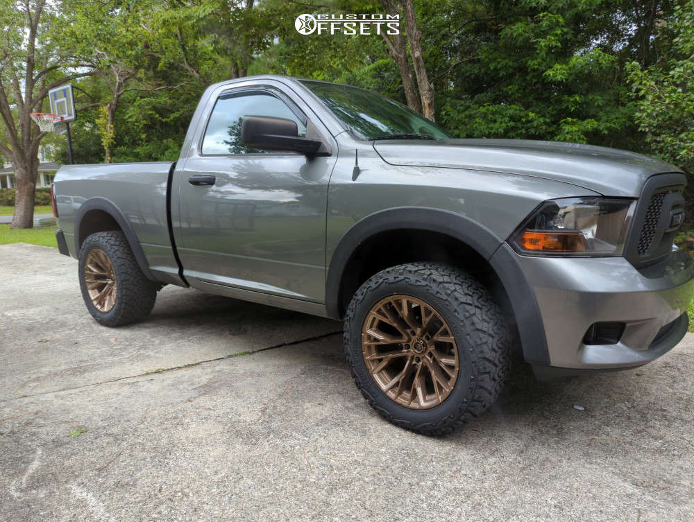 2012 Ram 1500 with 20x10 -18 Fuel Rebar 5 and 33/12.5R20 Venom Power ...