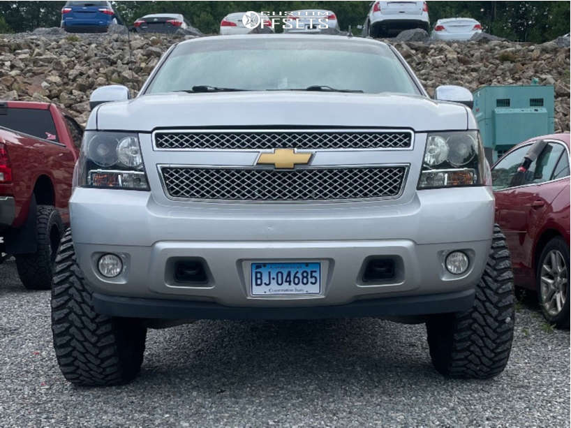 2011 Chevrolet Avalanche with 20x10 -29 Vision Sliver and 35/12.5R20 ...