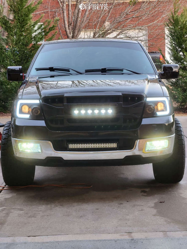 2004 Ford F-150 with 24x12 -44 Impact Offroad 820 and 305/35R24 AMP Pro ...