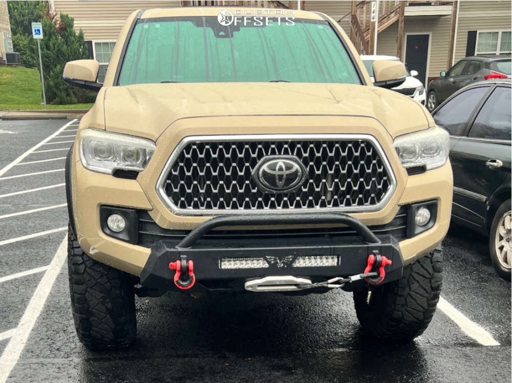 2018 Toyota Tacoma with 17x9 -12 Method Mr312 and 285/70R17 Nitto Ridge ...